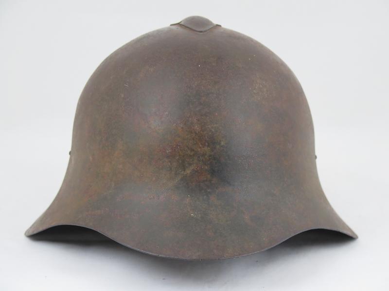 Dragoon Militaria | WW2 Finnish war trophy helmet Ssh36 battle damage shell