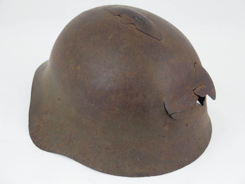 Dragoon Militaria | WW2 Finnish war trophy helmet Ssh36 battle damage shell