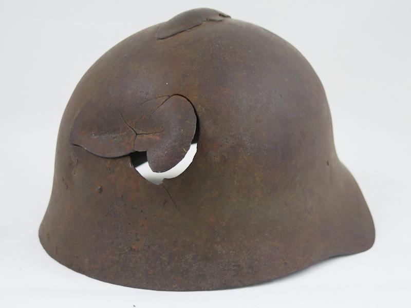 Dragoon Militaria | WW2 Finnish war trophy helmet Ssh36 battle damage shell